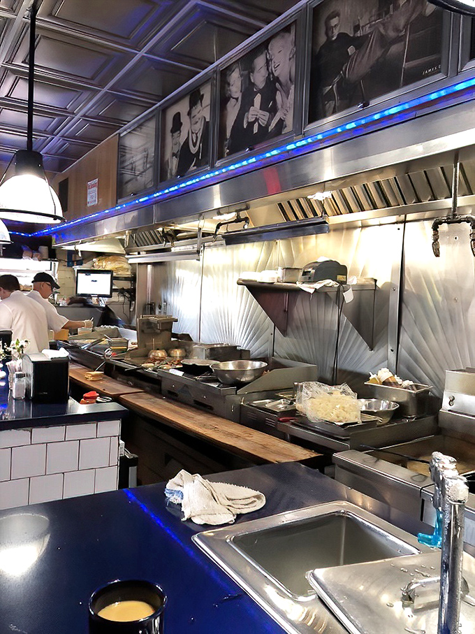 The kitchen—where breakfast magic happens. Those aren't just cooks, they're morning alchemists turning simple ingredients into gold.