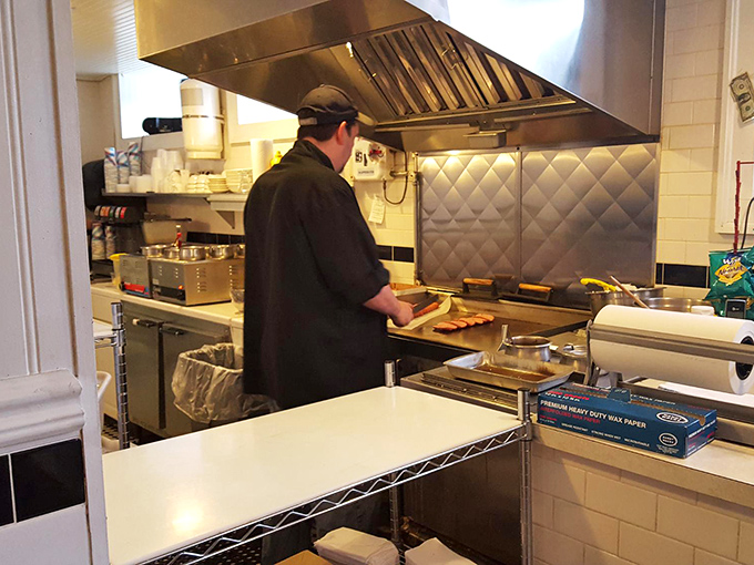 The kitchen where the magic happens. Simple equipment, practiced hands, and recipes guarded like state secrets.