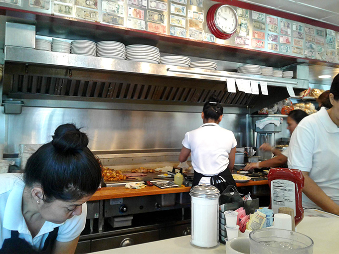 The choreography of the open kitchen reveals the ballet behind your breakfast &ndash; line cooks performing short-order magic amid sizzling symphonies.