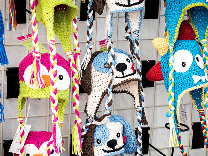 These whimsical crocheted animal hats transform toddler tantrums into giggles, proving that sometimes the best market finds aren't edible at all.