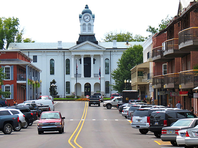 The Lafayette County Courthouse commands the square like a benevolent monarch, keeping watch over its charming kingdom.
