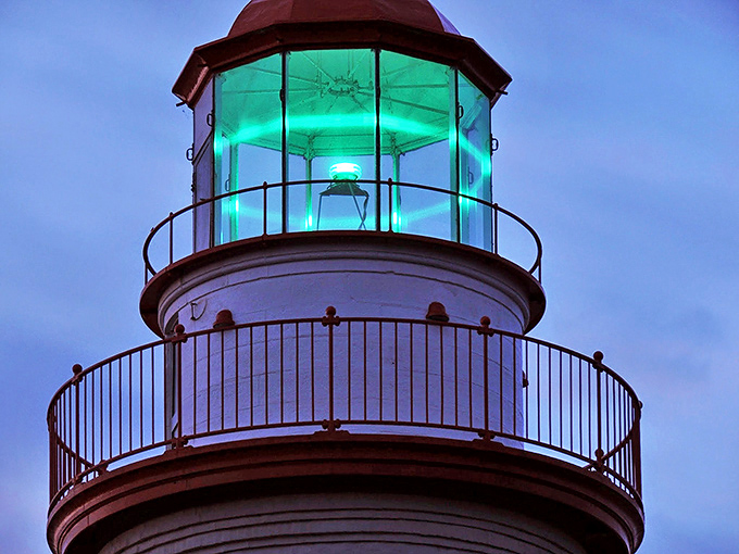 As twilight falls, the lighthouse's emerald beam cuts through darkness, a reassuring wink to vessels navigating Lake Erie's sometimes temperamental waters.