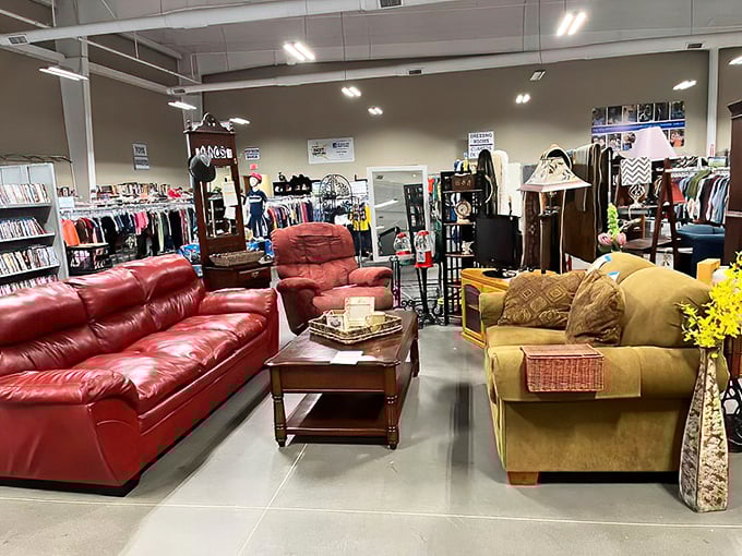 A crimson leather sofa faces off with its tan counterpart, both offering comfort and style at a fraction of what you'd pay new.