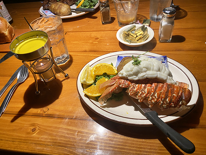 Lobster tail and drawn butter—proof that sometimes the best vacation romances happen right at your dinner table.