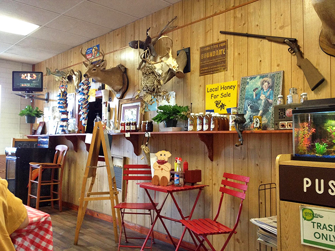 Beyond barbecue, local honey for sale adds a sweet touch to the rustic ambiance. The fish tank in the corner proves this place has unexpected personality.