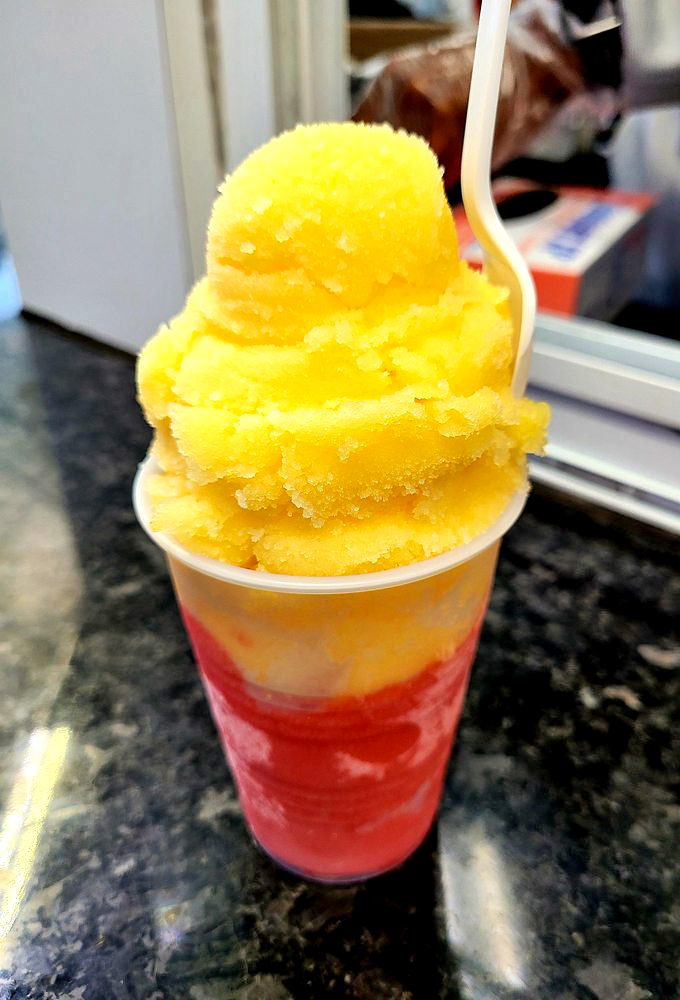 Sunshine in a cup! This mango-strawberry Italian ice delivers a tropical vacation without the airfare or sunburn.