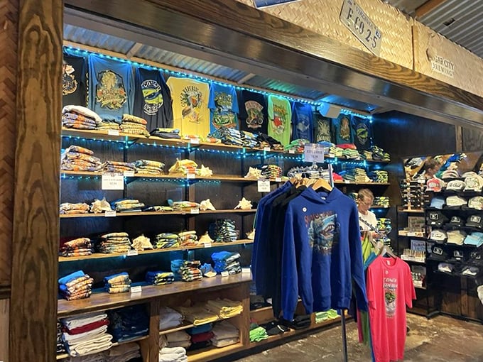 The merch wall: where you can buy a t-shirt to hide your post-seafood feast belly. Souvenir calories don't count!