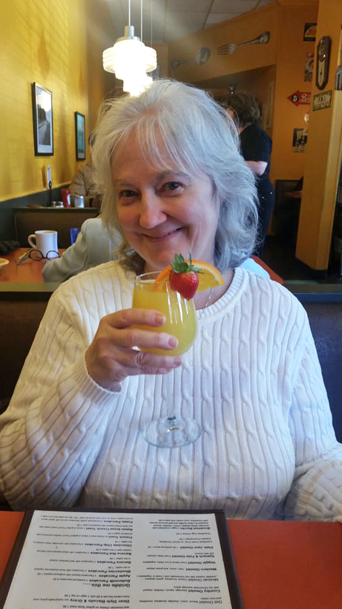 The diner's mimosa comes garnished with fresh fruit &ndash; because sometimes breakfast calls for a little celebration in a glass.