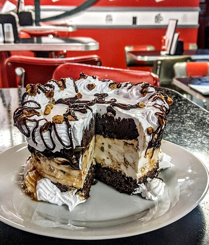 Not just cake, but an engineering marvel of chocolate, cream, and caramel. One bite and you'll understand why diets were meant to have cheat days.