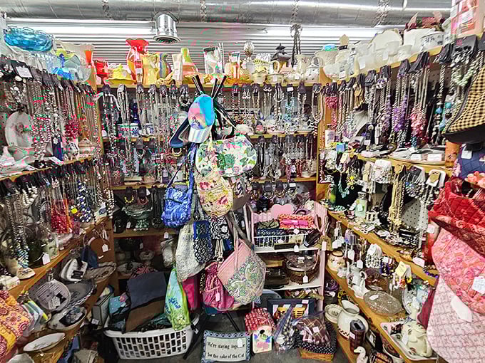 A jewelry vendor's paradise where necklaces hang like treasures from a pirate's chest – costume and vintage pieces waiting for their next special occasion.