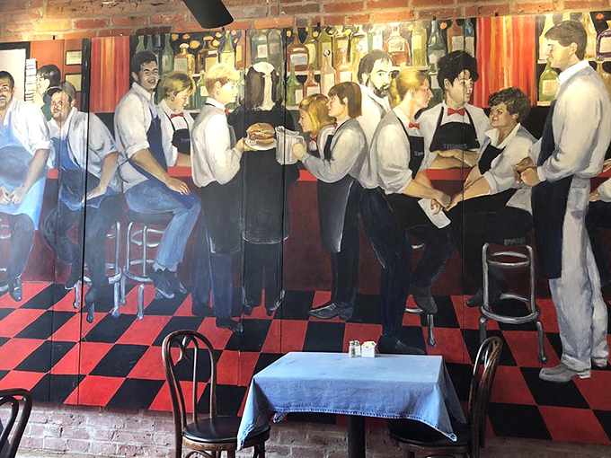 The restaurant's mural captures the spirit of service, though in real life, the staff moves too quickly to ever be caught standing still.