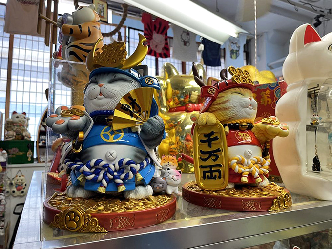 These regal cat figurines, dressed as ancient warriors or nobles, show that even in the cat kingdom, some felines have higher social standing than others.