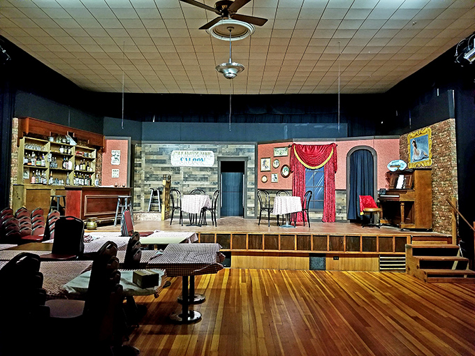 The Olde Glory Theatre's vintage stage whispers stories of performances past, when entertainment meant more than just scrolling through streaming options.