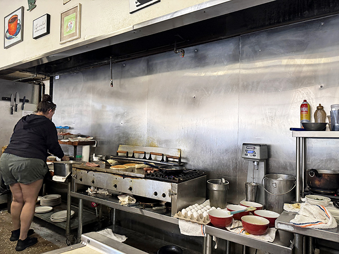 Behind the scenes where breakfast magic happens – no molecular gastronomy, just skilled hands that have flipped thousands of perfect eggs.