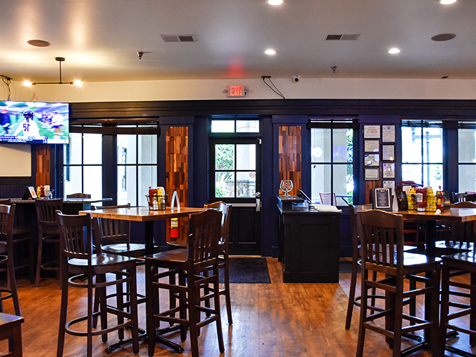High-top tables and strategically placed TVs create the perfect environment for both serious dining and casual "just one more quarter" game watching.
