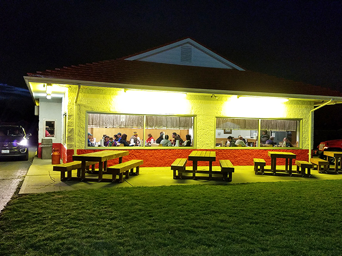 As night falls, the yellow glow from Bill's transforms it into a lighthouse for the BBQ-starved souls of Ohio.