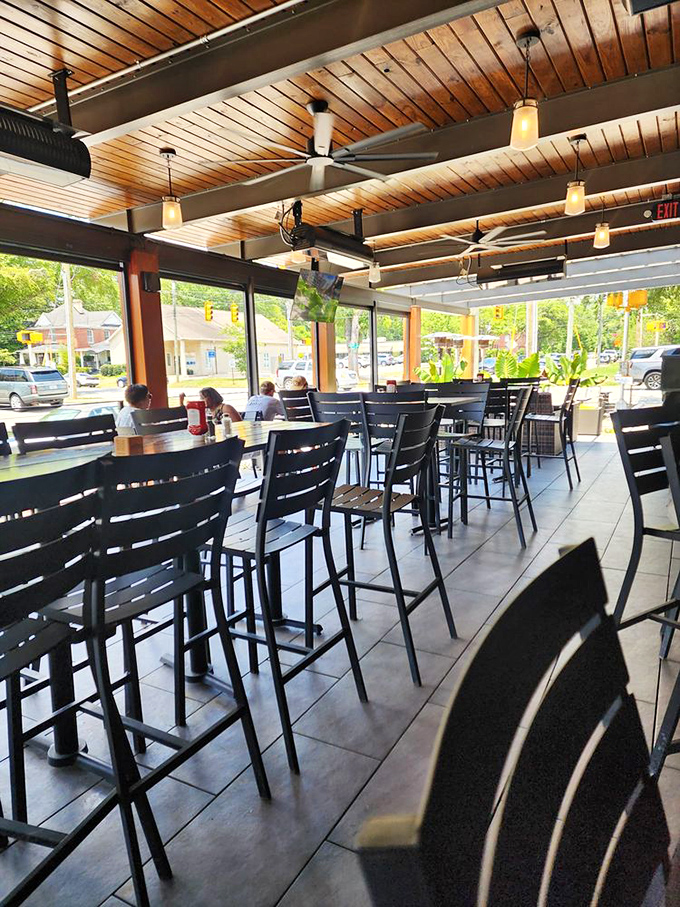 Wooden ceilings, natural light, and high-top seating create the perfect perch for people-watching while savoring your meal.