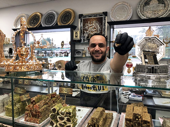 Behind every great candy kingdom is a passionate candy ambassador. The display case showcases traditional Middle Eastern sweets rarely found in Kentucky.