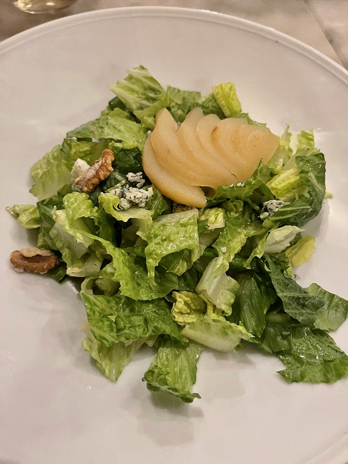 This isn't just salad; it's a sophisticated conversation between pears, blue cheese, and greens that somehow makes everyone at the table get along.