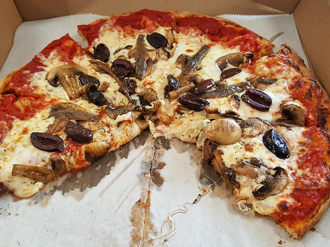 Pizza from a BBQ joint? Trust me on this one&mdash;wood-fired crusts and quality toppings make this an unexpected star.