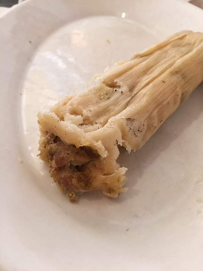 Unwrapping a tamale is like opening a present where the wrapping is part of the gift. This pork-filled treasure proves good things come in corn husks.