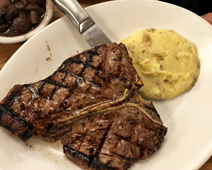 This porterhouse doesn't just command attention&mdash;it demands respect. The mashed potatoes know better than to try to upstage the main attraction.