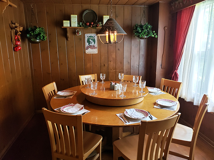 Rustic elegance in wood paneling and simple furniture&mdash;a dining room that whispers stories of family celebrations spanning generations.