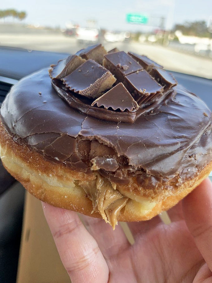 Chocolate and peanut butter unite in this donut masterpiece, proving that some relationships are simply meant to be.