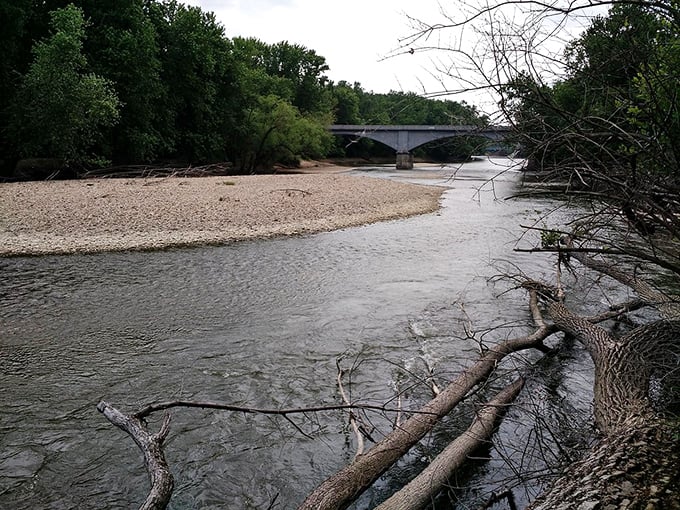 The Wabash River flows like liquid history through the landscape. Those rocky banks and gentle currents have shaped more than just the geography.
