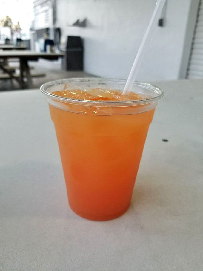 A sunset-colored rum punch that tastes like vacation in a cup. One sip and you'll understand why pirates never wanted to leave the Caribbean.