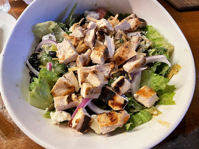 A salad that actually excites. Fresh greens topped with perfectly grilled chicken chunks that make eating healthy feel like cheating.