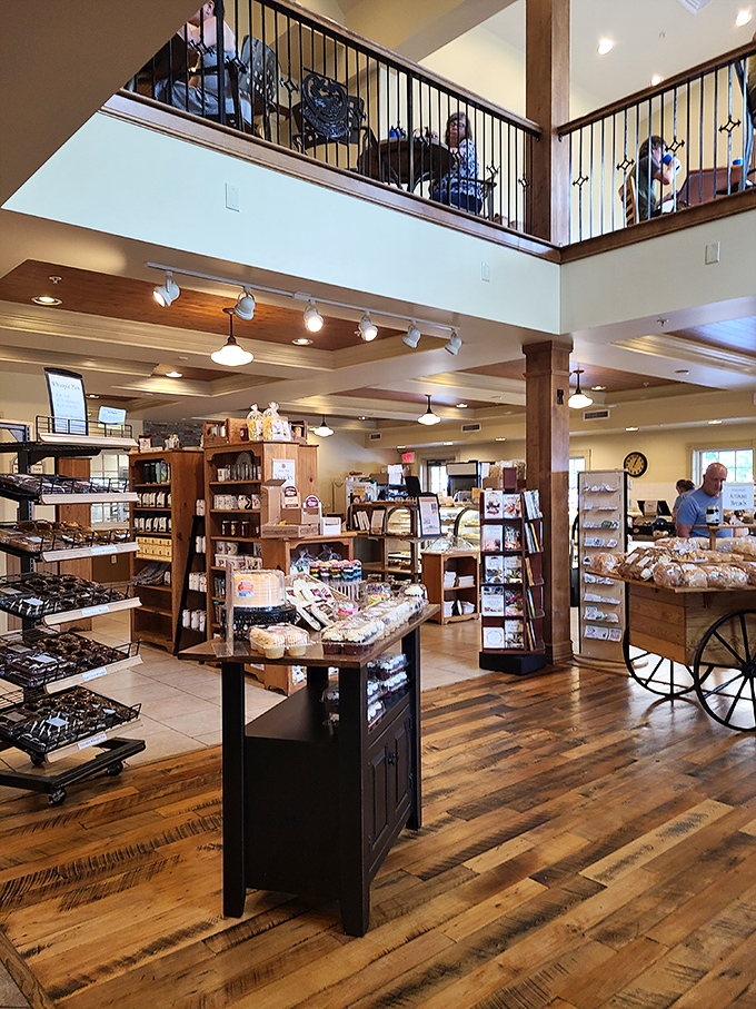 A two-story temple to temptation. The bakery's open layout invites exploration, with each wooden shelf and display case offering new possibilities for delicious discovery.