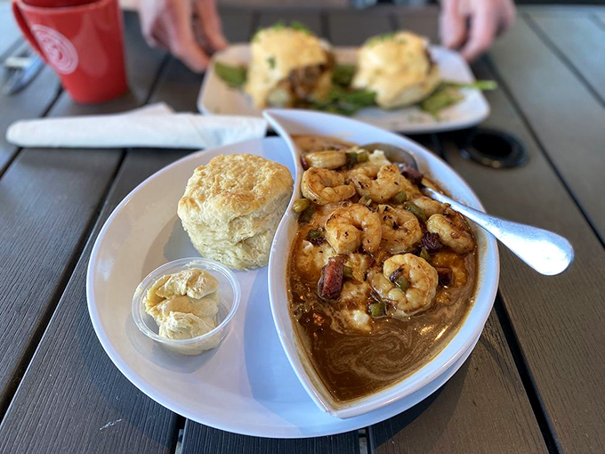 A mimosa in the background means it's officially brunch o'clock, while those grits and biscuit remind you you're firmly in Southern breakfast territory. 
