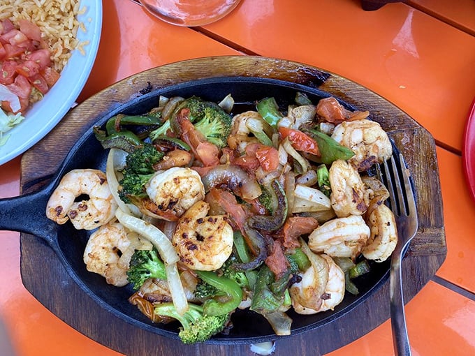 Shrimp fajitas with broccoli&mdash;proof that seafood and vegetables can party together deliciously. The sizzle is just bonus entertainment.