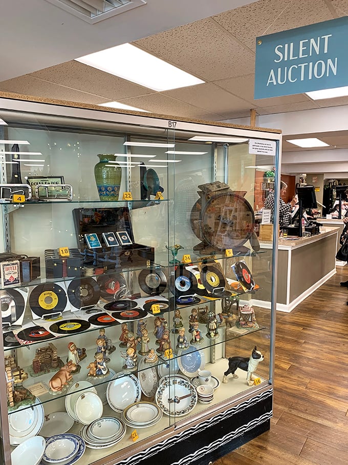 The silent auction area—where the truly special finds get their moment in the spotlight before finding new homes.