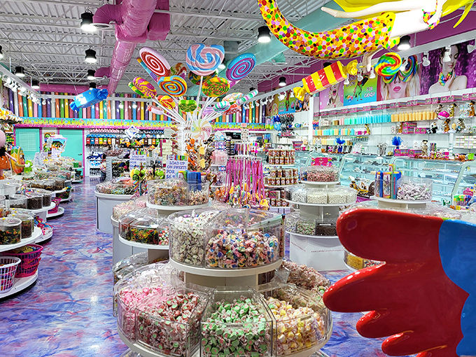 A panoramic view of sugar paradise where even the floors swirl with candy colors to complete the immersive sweet experience.