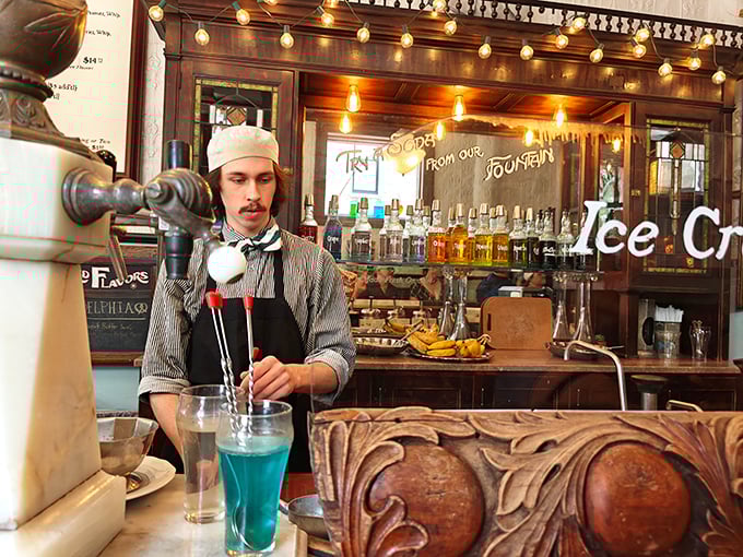 The soda jerk's bow tie and paper hat aren't costumes&mdash;they're symbols of dedication to craft. That blue concoction might just change your life.