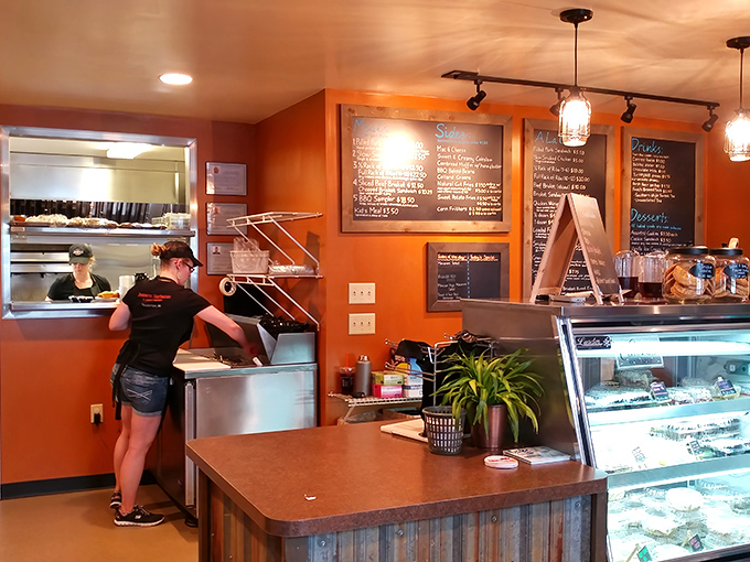 Behind the counter, where barbecue dreams are assembled and handed over to eager customers with the care of artisans.