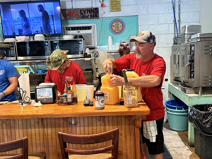 Behind every perfect oyster is someone who knows exactly what they're doing. These folks aren't just staff; they're seafood artists.