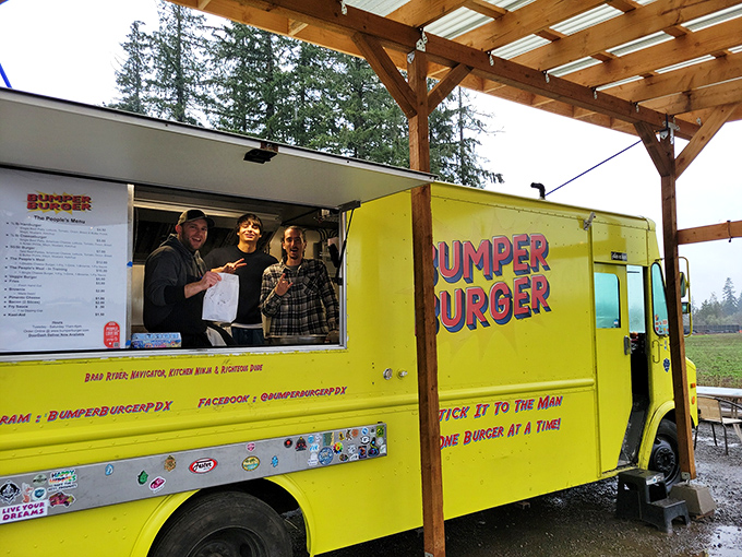 The bright yellow Bumper Burger truck isn't just a kitchen &ndash; it's a stage where culinary magic happens daily, served with genuine smiles and Oregon hospitality.