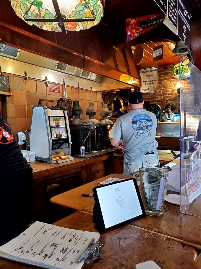 Where burger magic happens. The staff works with the focused precision of artisans who know they're creating something greater than the sum of its parts.