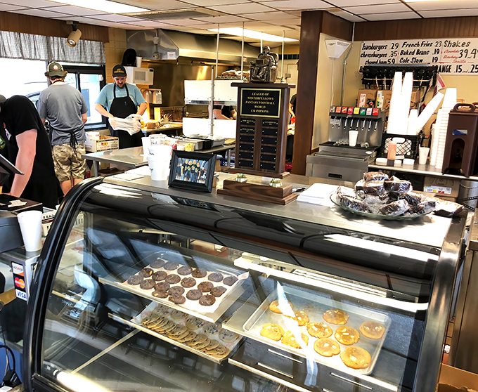 Behind every great burger is a team that knows exactly what they're doing. No fancy chef coats needed when you've got skills.