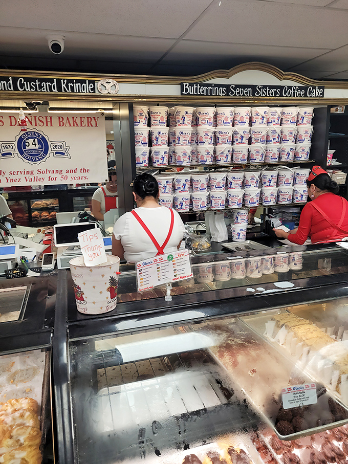 Behind the counter, the real magic happens. These aren't just bakers&mdash;they're happiness engineers working with flour, butter, and generations of Danish know-how.
