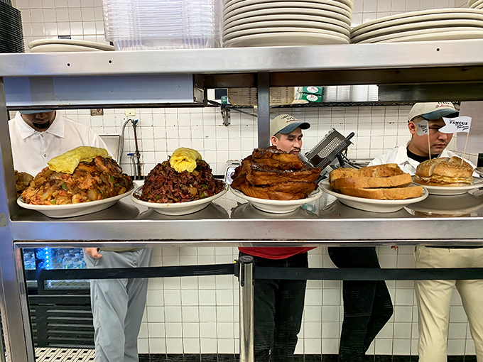 Behind the counter, sandwich architects prepare plates that make customers' eyes widen with equal parts delight and "How am I supposed to eat that?"