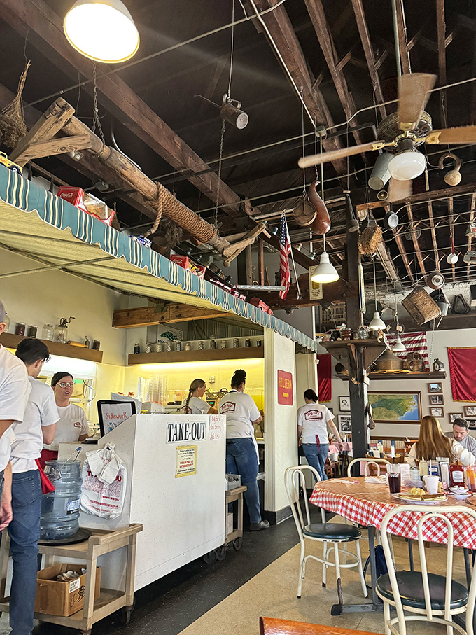 The take-out counter where dreams are packaged to go. These folks are the gatekeepers to happiness wrapped in styrofoam.
