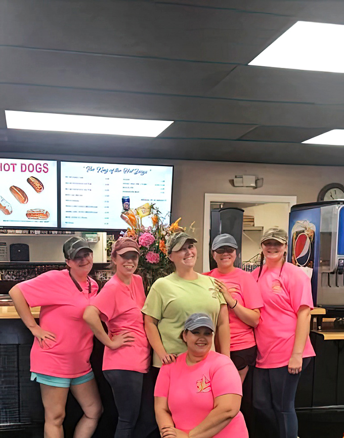 The team behind the legend&mdash;these ladies in pink shirts are the keepers of the flame, guardians of a hot dog tradition that spans generations.