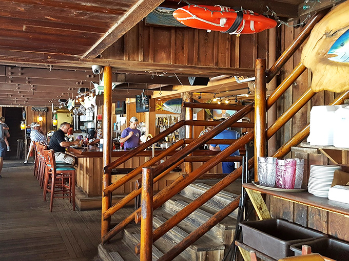 Rustic wooden stairs leading to more dining adventures upstairs. Even the staircase looks like it has stories to tell.