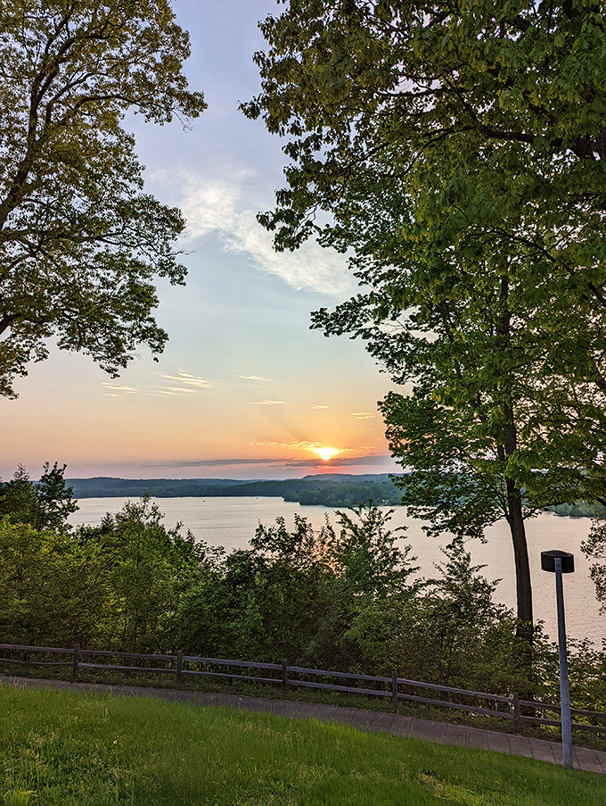 Sunset paints Pleasant Hill Lake in watercolor hues of gold and amber. This magical moment transforms an ordinary evening into something worth remembering.