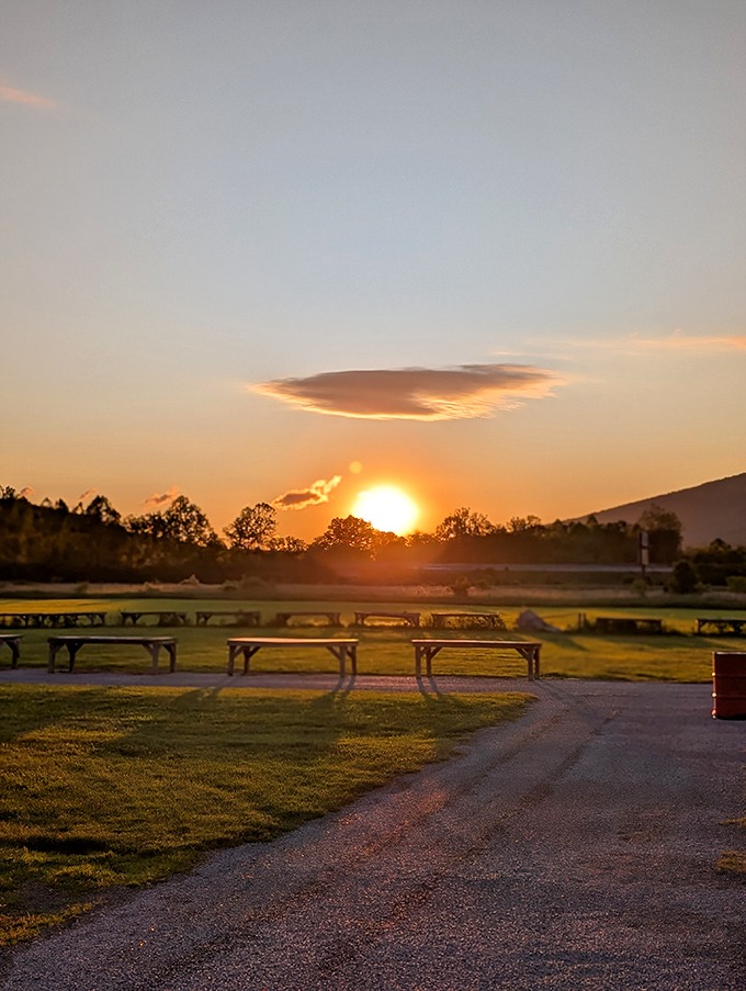 As the sun sets over the Allegheny Mountains, empty vendor tables await next Sunday's treasures. Even flea markets need their beauty rest.