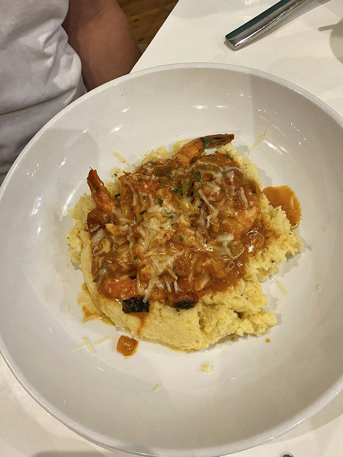 Swamp Grits bring the bayou to your table&mdash;plump shrimp nestled on creamy grits, all bathed in a sauce that's worth every last spoonful.